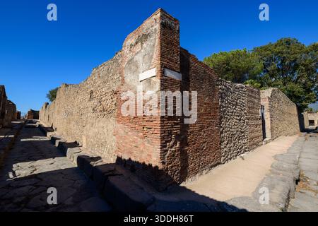 A street corner building in Pompeii, showing a preserved example of ...