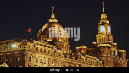 Shanghai, China. Clock tower of Shanghai, soaring beautifully at night ...