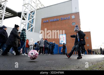 A young Blackburn Rovers fan playing football outside the ground before ...
