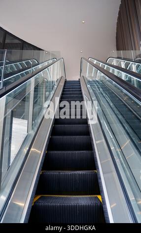 Concept photo of glass auto electric escalator with led lighting system ...