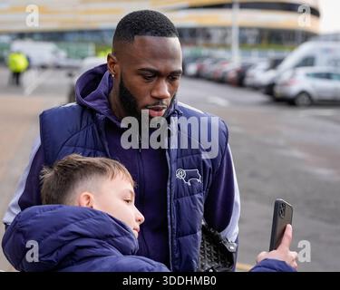Corey Blackett-Taylor of Derby County under pressure from Ryan Longman ...