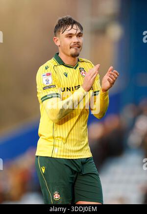 Callum Doyle of Wrexham applauds the fans after the final whistle ...