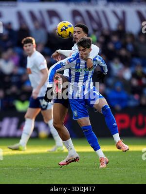 Preston North End's Jamal Lewis (left) and Derby County's Joe Ward ...