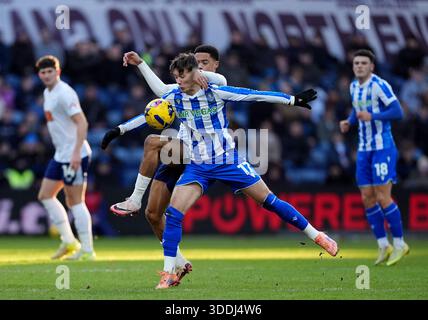 Preston North End's Jamal Lewis (left) and Derby County's Joe Ward ...