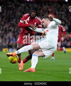 Jeremie Frimpong of Liverpool battle for the ball with Nathanael Ogbeta ...