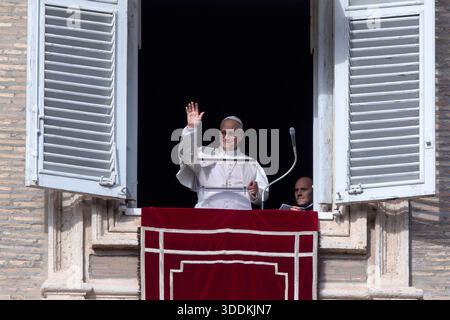 Pope Leo XIV delivers his Angelus prayer from the central loggia of St ...