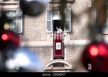 Pope Leo XIV delivers his Angelus prayer from the central loggia of St ...