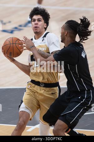 Washington Wizards guard Will Riley (27) goes to the basket against ...