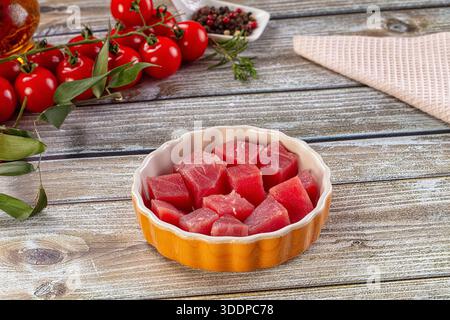 Raw tuna fish cubes heap for poke Stock Photo - Alamy