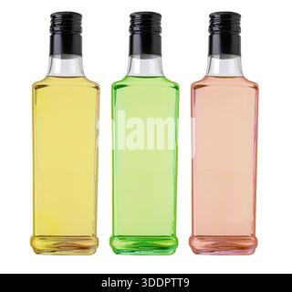 Three glass bottles containing liquids, one glass dropper, green leaves ...