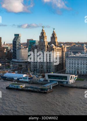 Aerial sunrise over Liverpool and Royal Liver Building twin towers ...