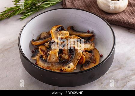 Vegan cuisine - roasted champignon slices served rosemary Stock Photo ...