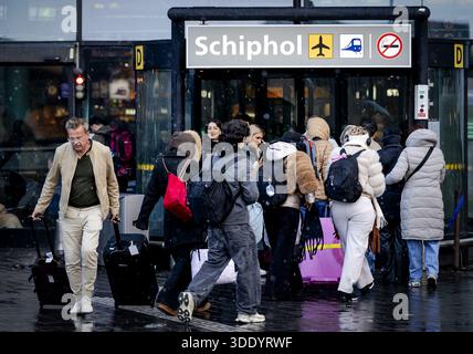 SCHIPHOL - Travelers at Schiphol Airport. Hundreds of flights have been ...