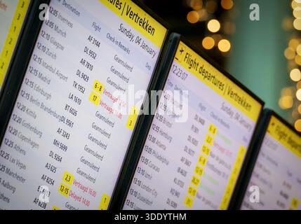 SCHIPHOL - Information boards at Schiphol Airport. Hundreds of flights ...