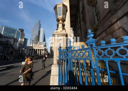 People walk past the Royal Bank Tower in Montreal on Thursday, June 19 ...