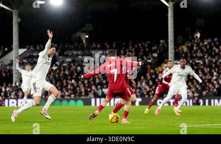 Liverpool's Florian Wirtz scores their side's third goal of the game ...