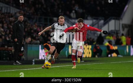Sondre Langås of Derby County challenges Noah Okafor of Leeds United ...