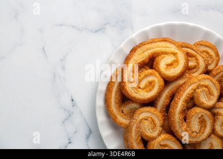Palmiers or elephant ears, puff pastry cookies Stock Photo - Alamy