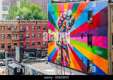 New brightly painted urban high-rise buildings on a sunny summer day ...