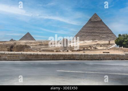 Scenic view over the Great Sphynx and the three main Pyramids of the ...