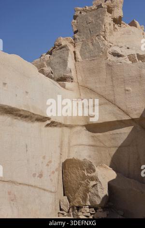 Rock face with ancient petroglyphs and carved symbols visible on ...