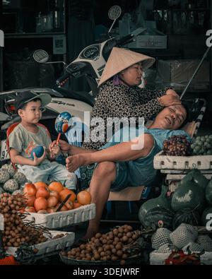 Nha Trang, Vietnam, September 27, 2025. A candid snapshot of an elderly ...