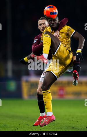 Keinan Davis of Udinese FC competes for the ball with Victor Nelsson of ...