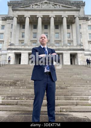 Ulster Unionist MLA Jon Burrows on steps of Parliament Buildings ...