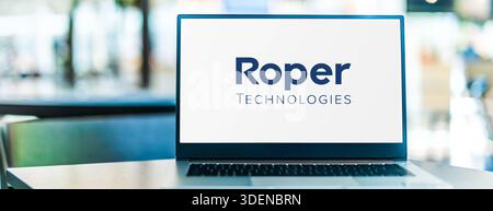 POZNAN, POL - NOV 25, 2025: Laptop computer displaying logos of ...