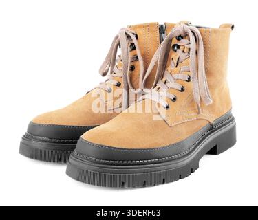 beige boots. ankle boots on yellow background. shoe store. shopping ...