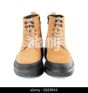 beige boots. ankle boots on yellow background. shoe store. shopping ...