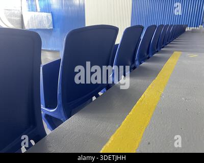 benches, stairs and an empty stadium for a sporting event Stock Photo ...
