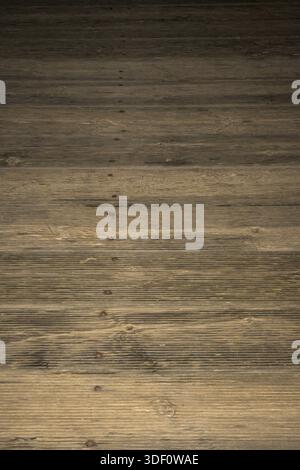 A detailed view of weathered wooden deck planks arranged in parallel ...