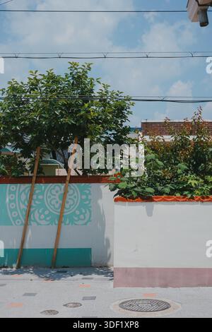 Shadow of a cable on a patterned wall of a building (minimal Stock ...