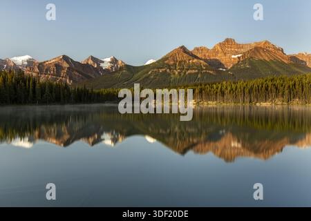 Mountains against clear sky at Jasper National Park seen through car's ...