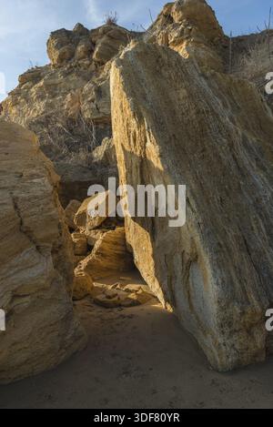 Big yellow stones on the shore Stock Photo - Alamy