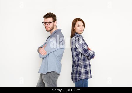 Break up, upset couple back to back after quarrel Stock Photo - Alamy