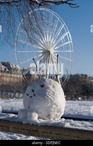 Paris, France - 01 07 2026: Snow flakes. View statue The Oath of ...