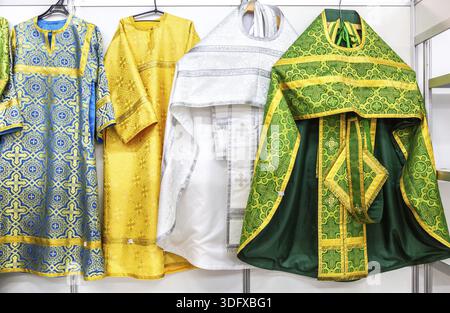 Different solemn colorful orthodox priest's robes Stock Photo - Alamy
