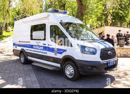 Inscription "Police, Crime lab" on the board of russian police vehicle ...