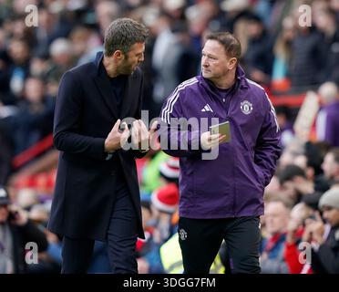 Manchester United head coach Michael Carrick leaves the pitch after ...