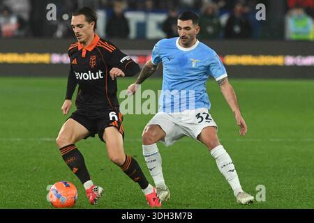 Maxence Caqueret of Como 1907 competes for the ball with Manuel ...