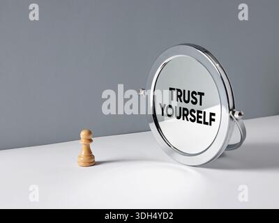 Self reflection symbol. Concept words Success begins with self ...