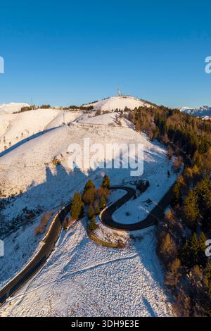 Aerial view of the Mottarone mount during a winter sunrise. Stresa ...
