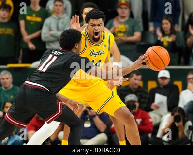 Texas Tech guard Jaylen Petty (11) os defended bu West Virginia guard ...