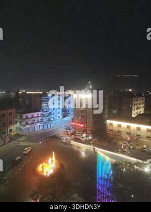 Illuminated Lights Display with Night Cityscape Background Featuring ...