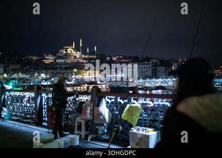 Istanbul, Turkey. 21st Jan, 2026. People seen fishing on the Galata ...