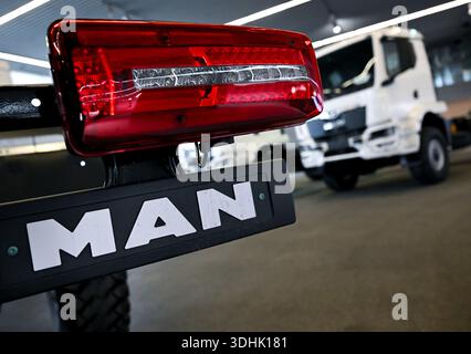 Munich, Germany. 22nd Jan, 2026. The MAN Truck & Bus logo can be seen ...