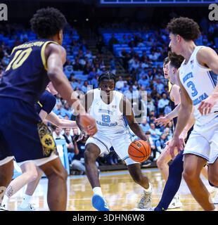January 21, 2026: North Carolina center Henri Veesaar (13) drives to ...