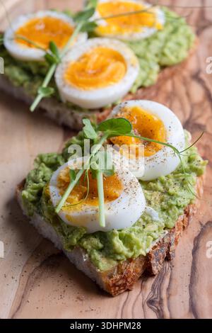 Homemade Avocado Toast with Eggs for Brunch Stock Photo - Alamy